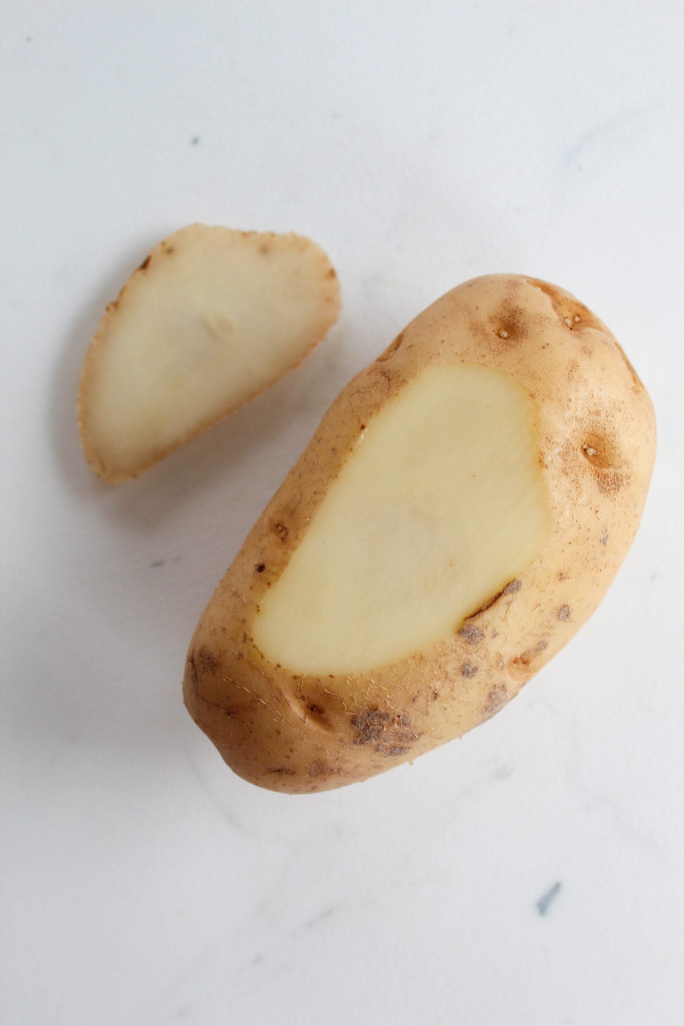 Easy Cheesy Scored Baked Potatoes